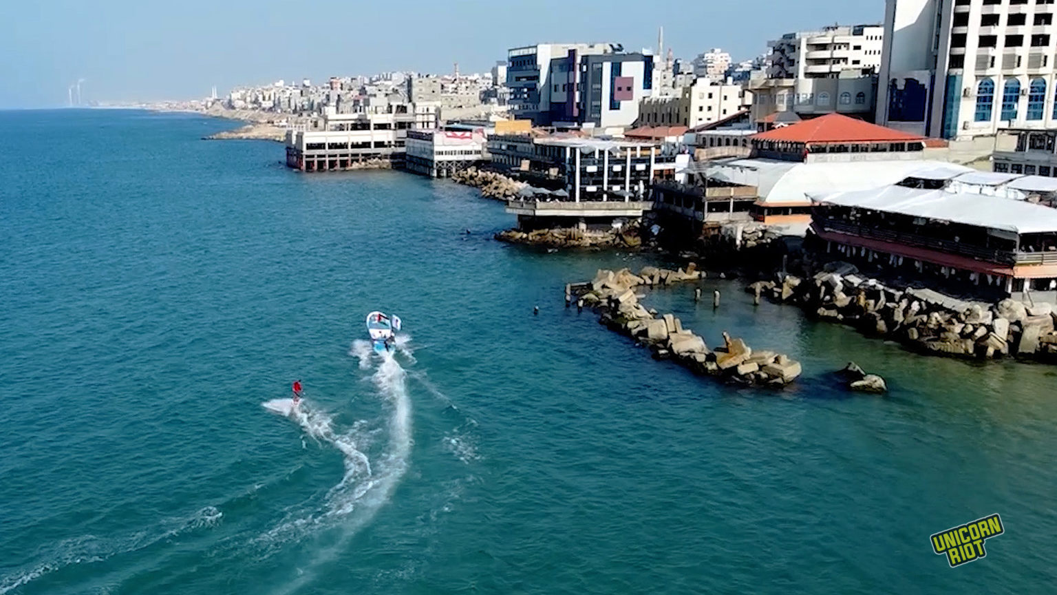 Surfing Santas in Gaza Welcome a New Year of ‘Prosperity and Happiness ...