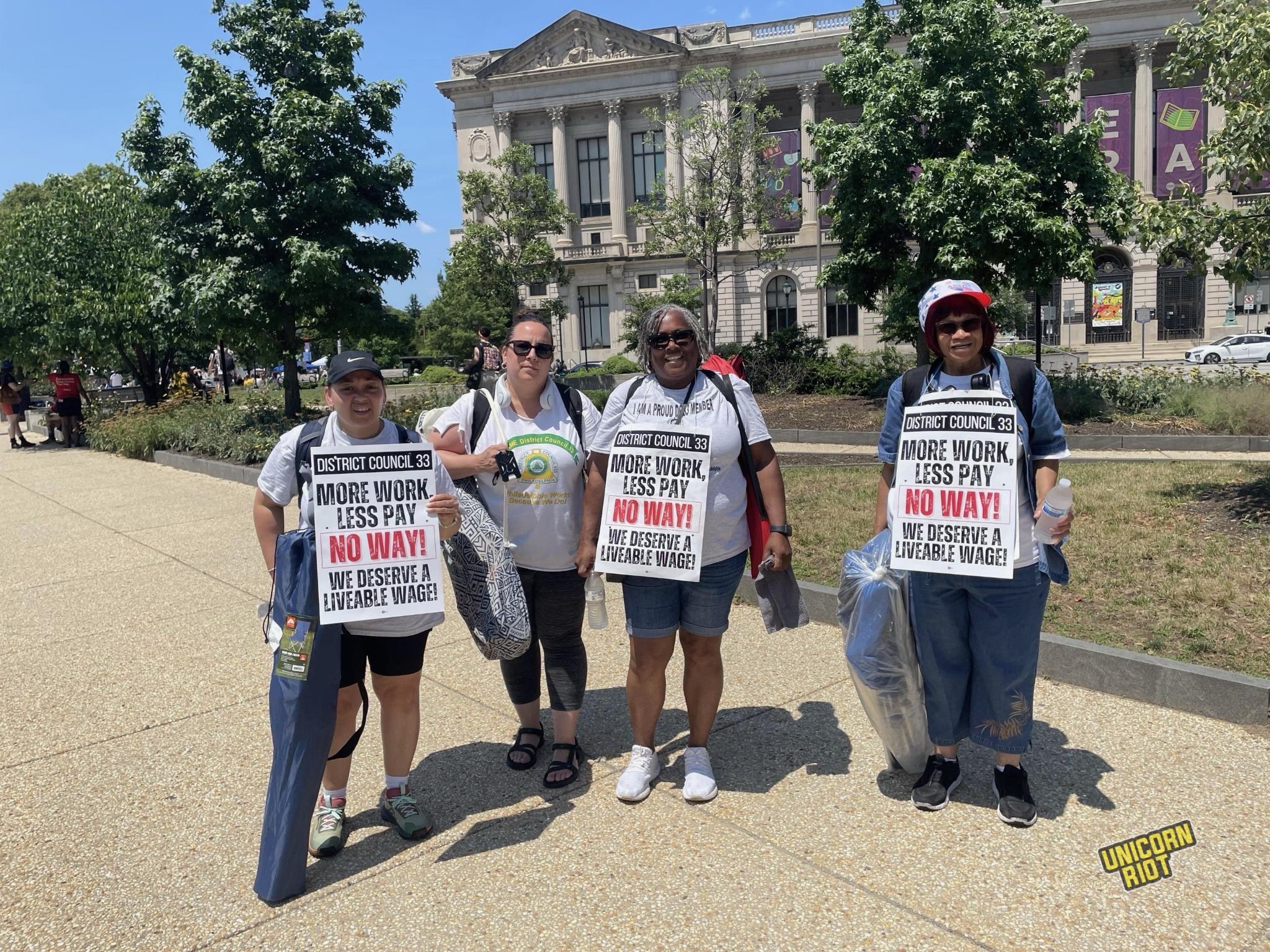 DC_33_members_with_signs-parkway-July-4-2025 - UNICORN RIOT